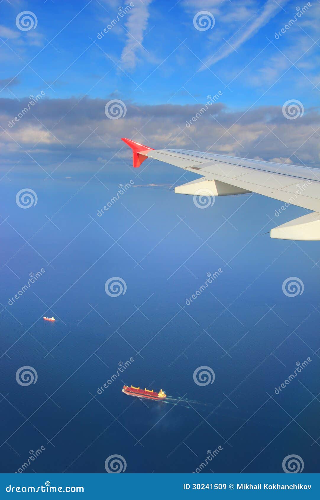 Cargo Ships Under Wing of Flying Plane Stock Image - Image of transport ...