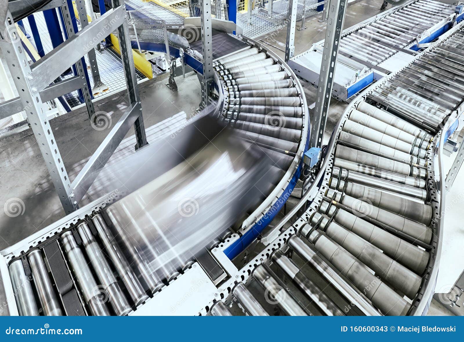 Transportation Line Conveyor Roller with Container in Motion Stock ...