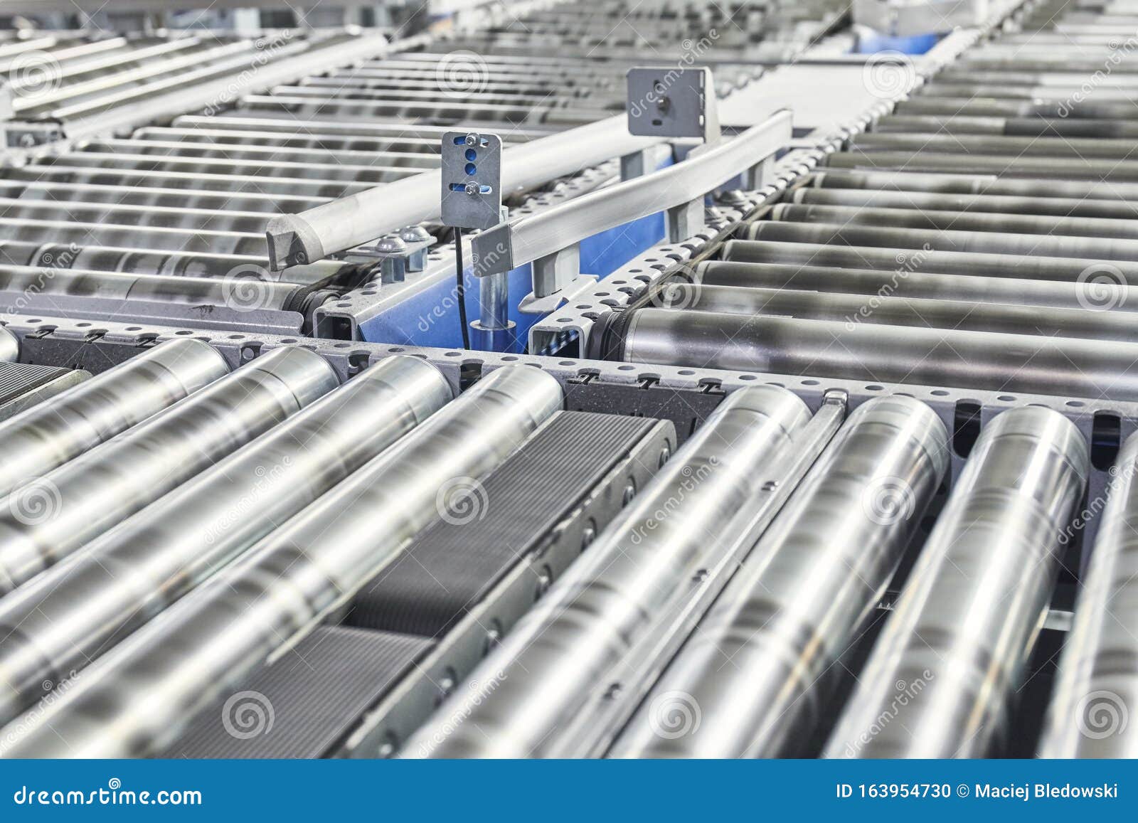 Transportation Line Conveyor Roller in Motion Stock Photo - Image of ...