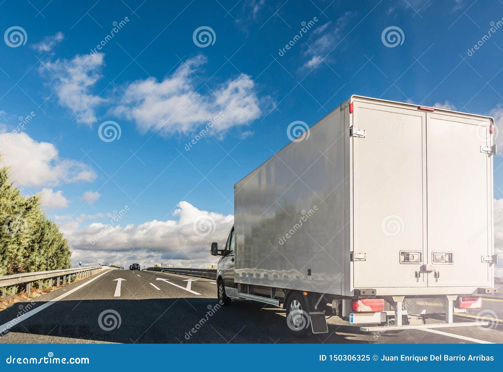 Transportation of Merchandise on the Road in a Small Truck Stock Image ...