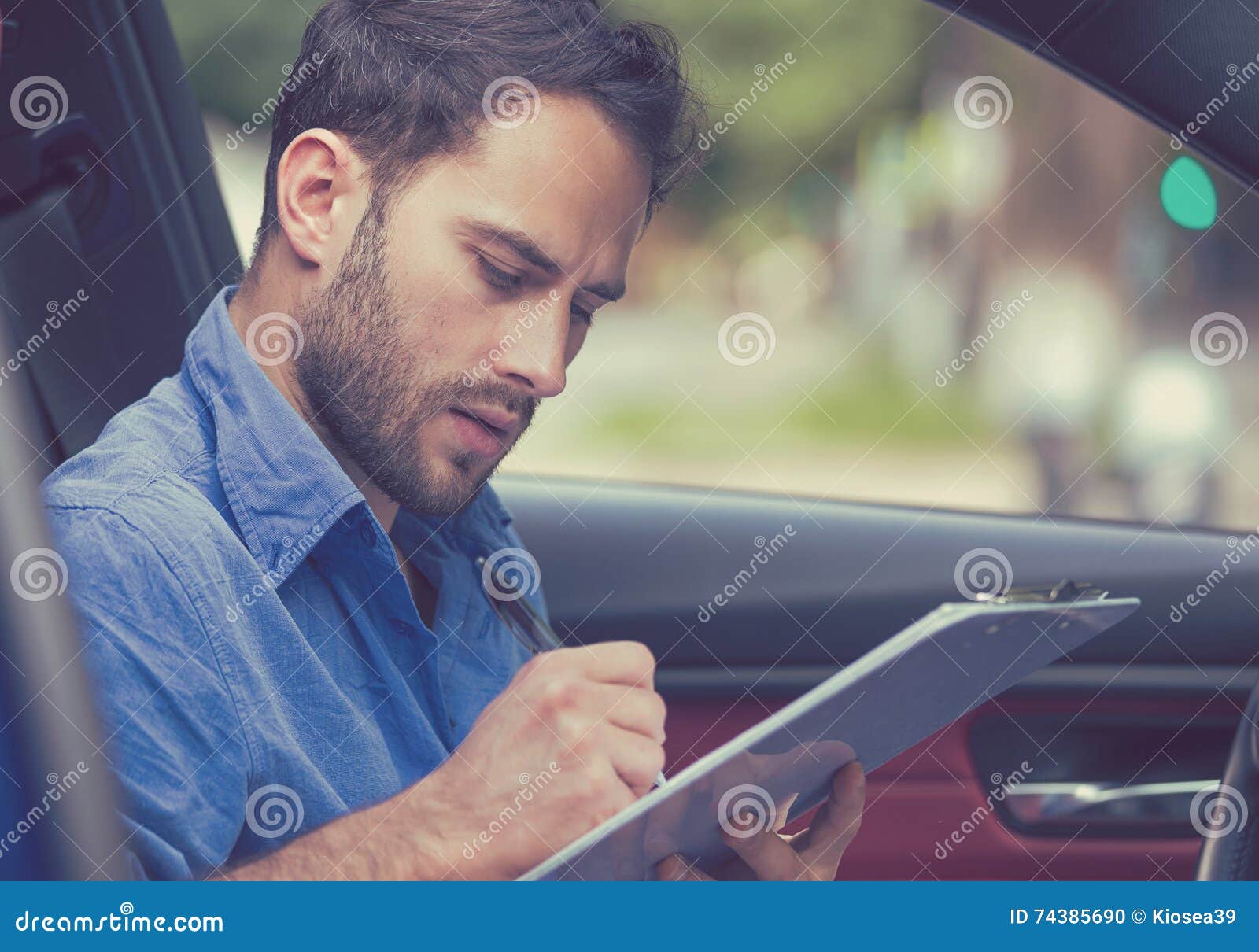 Transportation Ownership Concept. Man Inside New Car Reading Signing ...