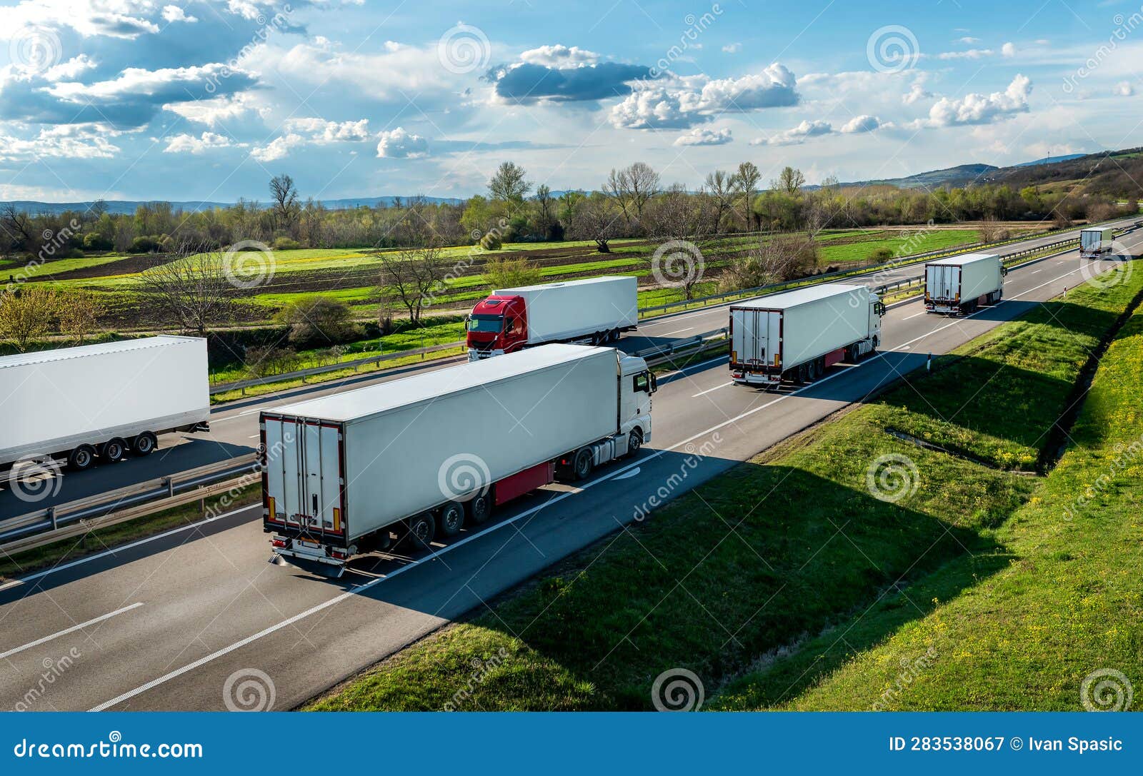 Transportation Trucks in Lines Passing Stock Image - Image of train ...