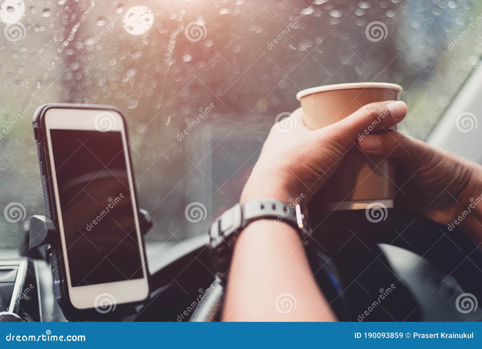 Transportation and Vehicle Concept - Driver Drinking Coffee while ...