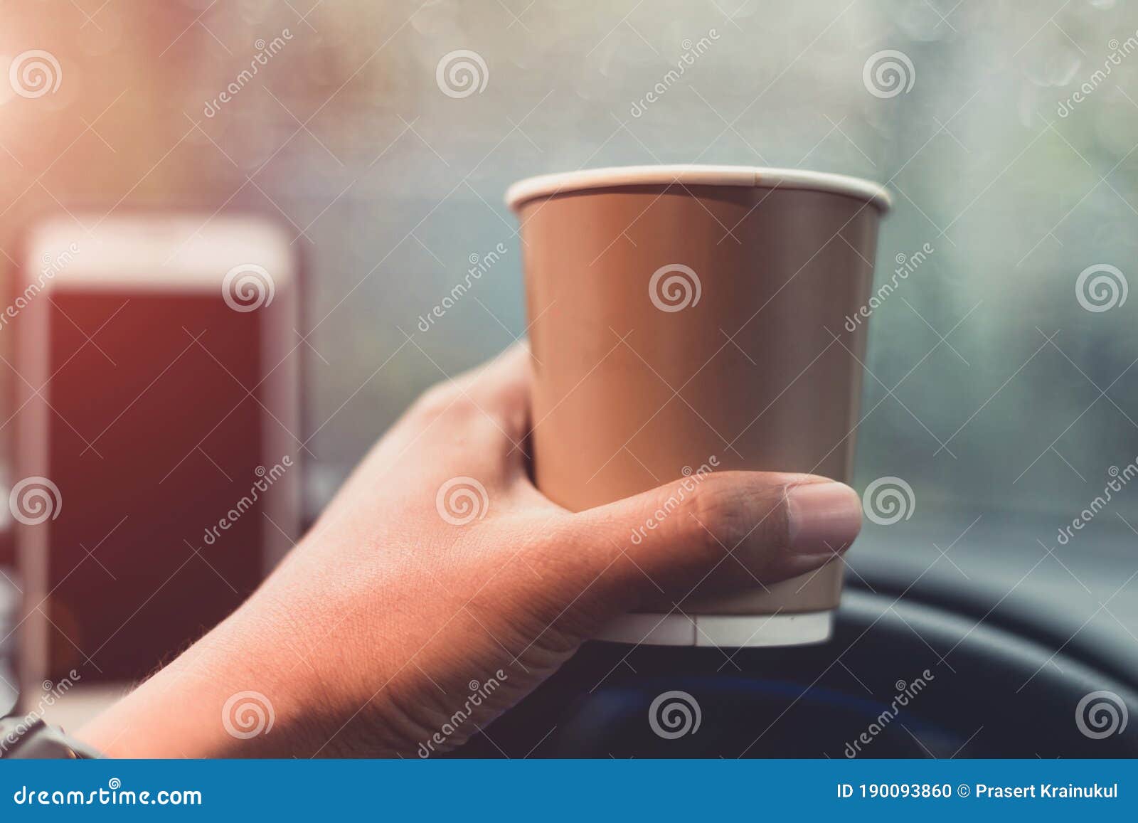 Transportation and Vehicle Concept - Driver Drinking Coffee while ...