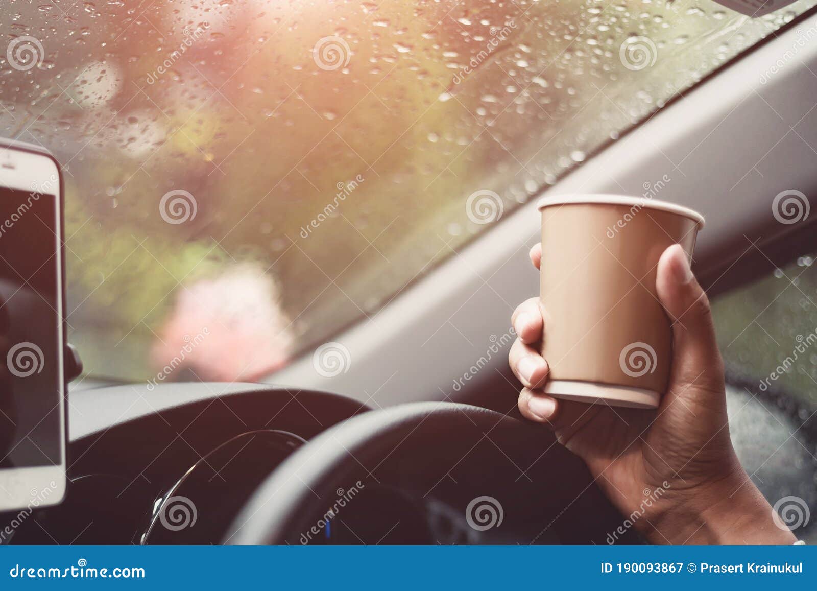 Transportation and Vehicle Concept - Driver Drinking Coffee while ...