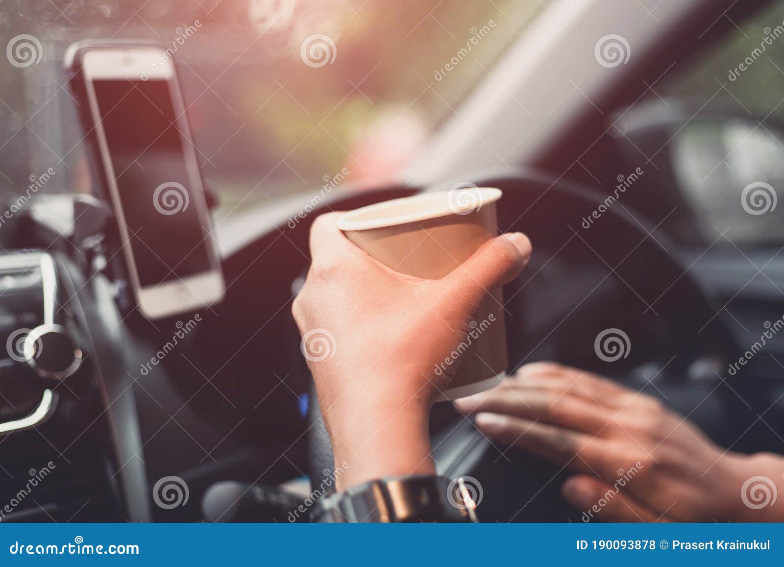 Transportation and Vehicle Concept - Driver Drinking Coffee while ...