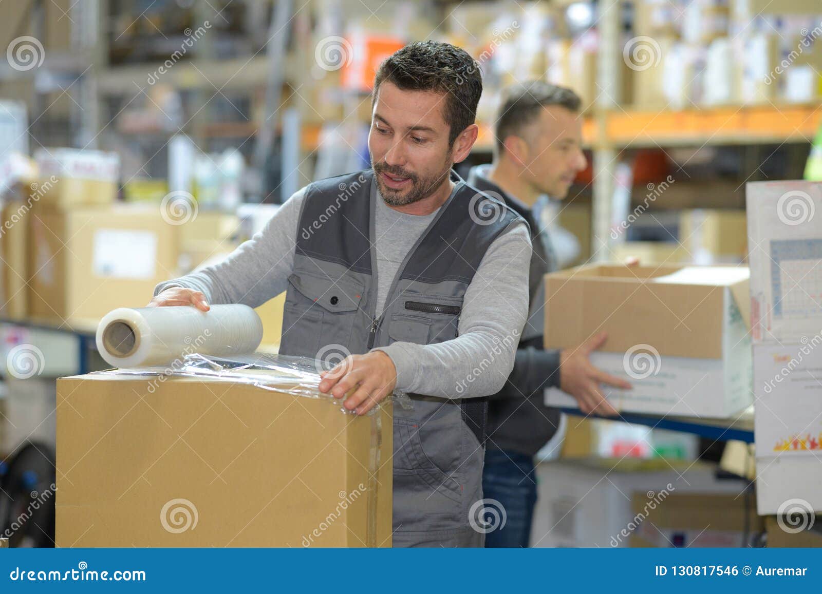 Transportation Worker Delivering Boxes To House Stock Photo - Image of ...