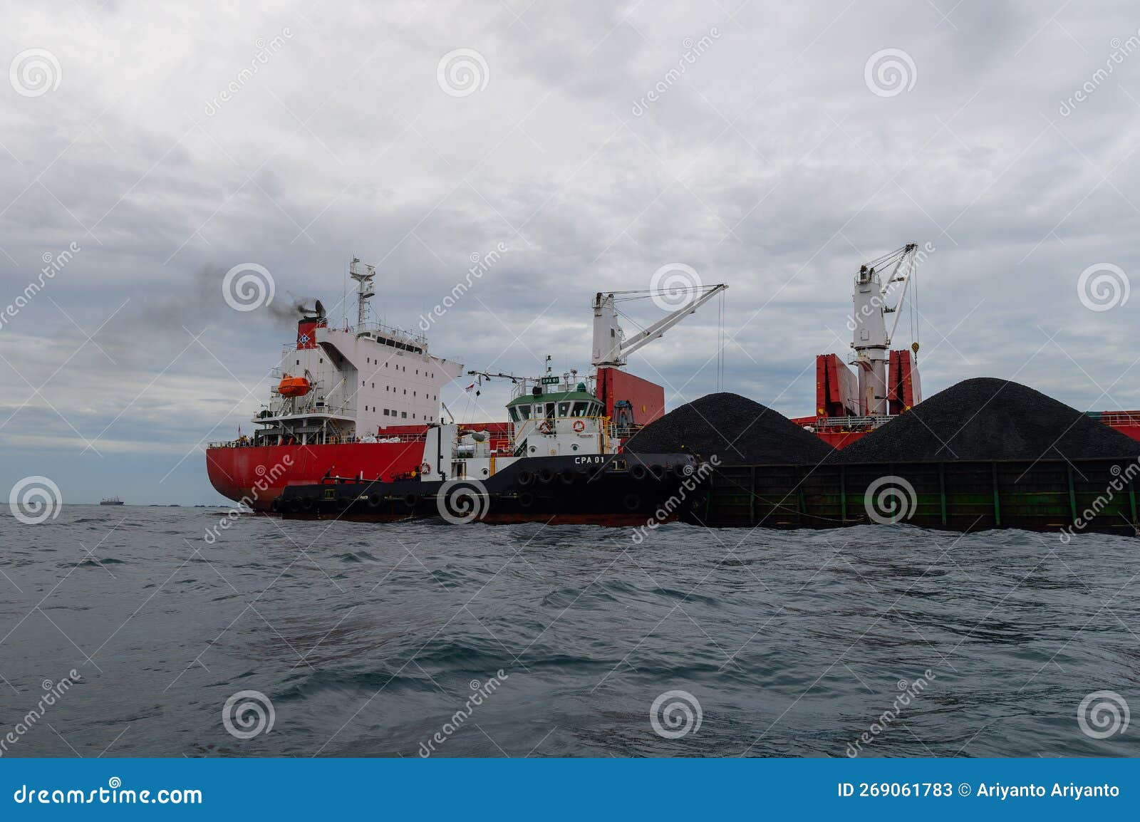 Transporting Coal into Large Ships in the Middle of the Sea Editorial ...