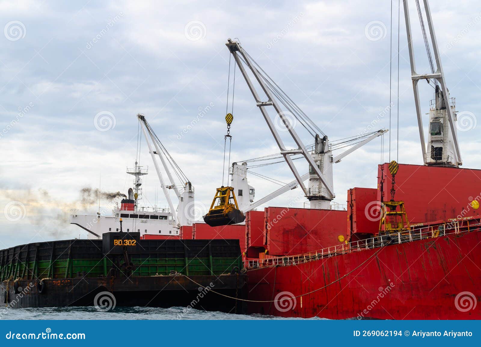 Transporting Coal into Large Ships in the Middle of the Sea Editorial ...