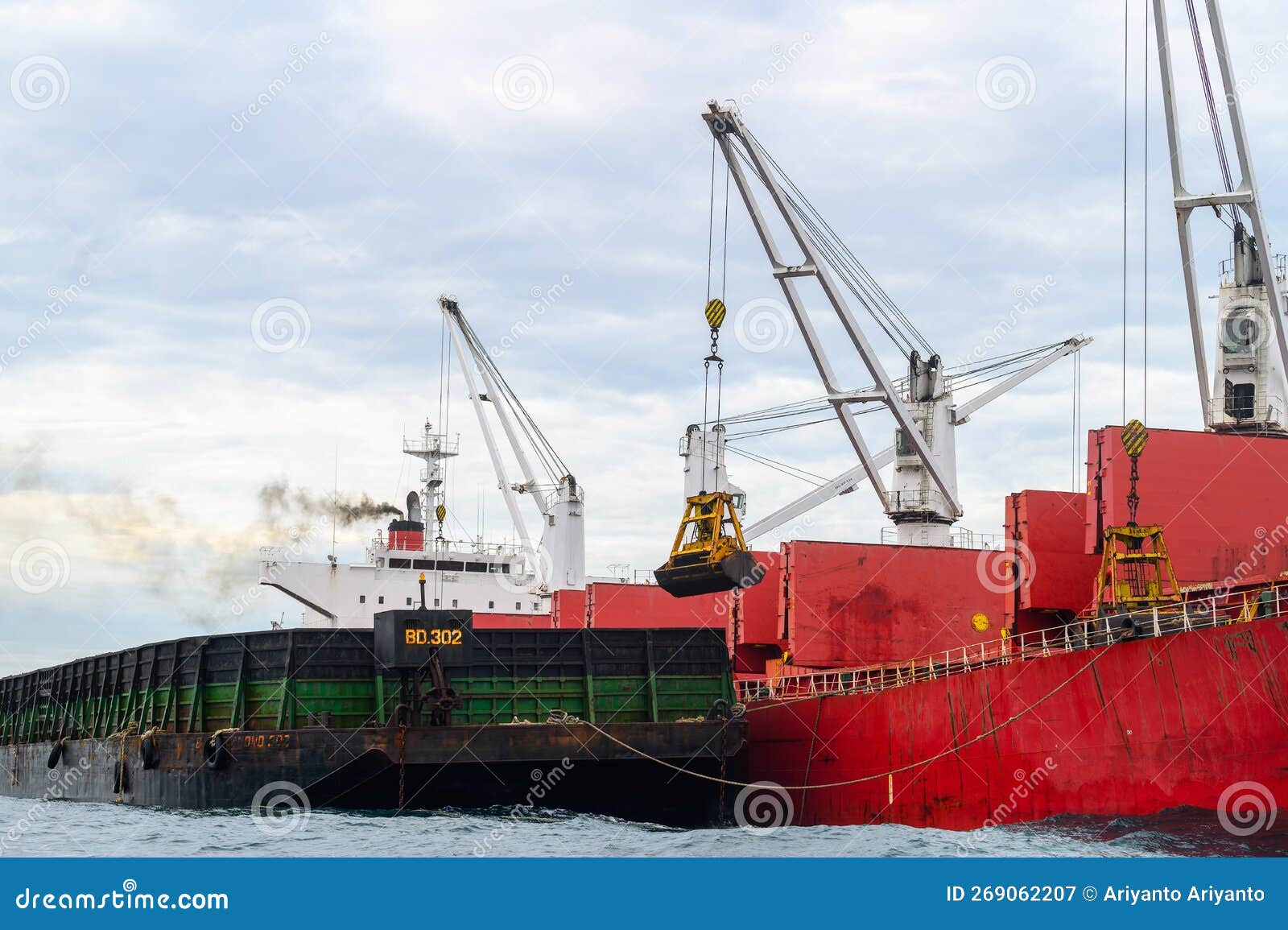 Transporting Coal into Large Ships in the Middle of the Sea Editorial ...