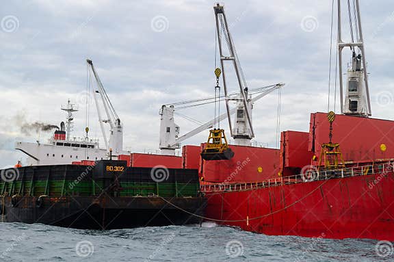Transporting Coal into Large Ships in the Middle of the Sea Editorial ...