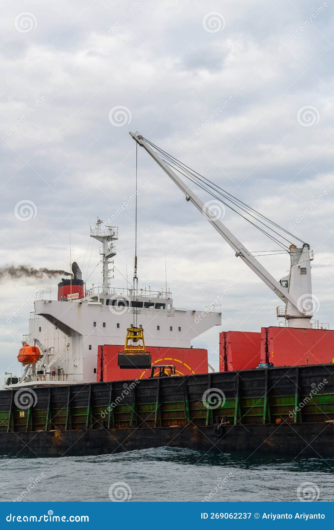 Transporting Coal into Large Ships in the Middle of the Sea Stock Image ...