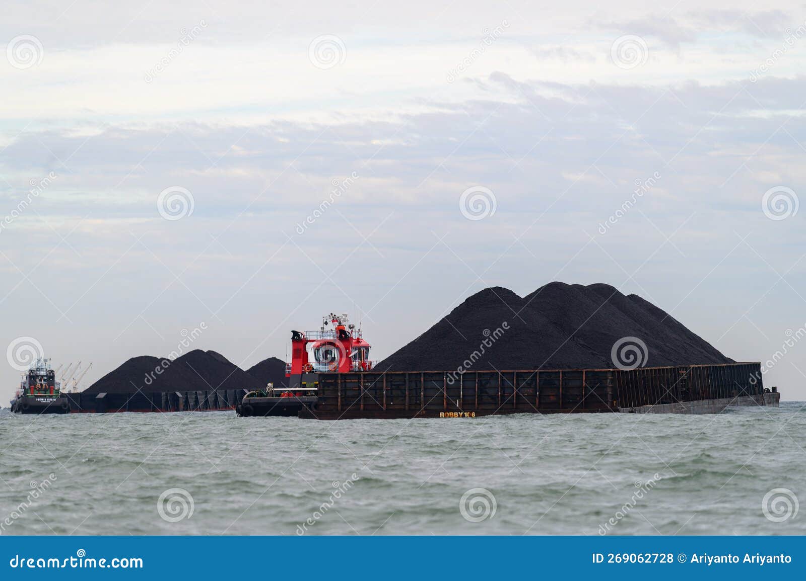 Transporting Coal into Large Ships in the Middle of the Sea Editorial ...