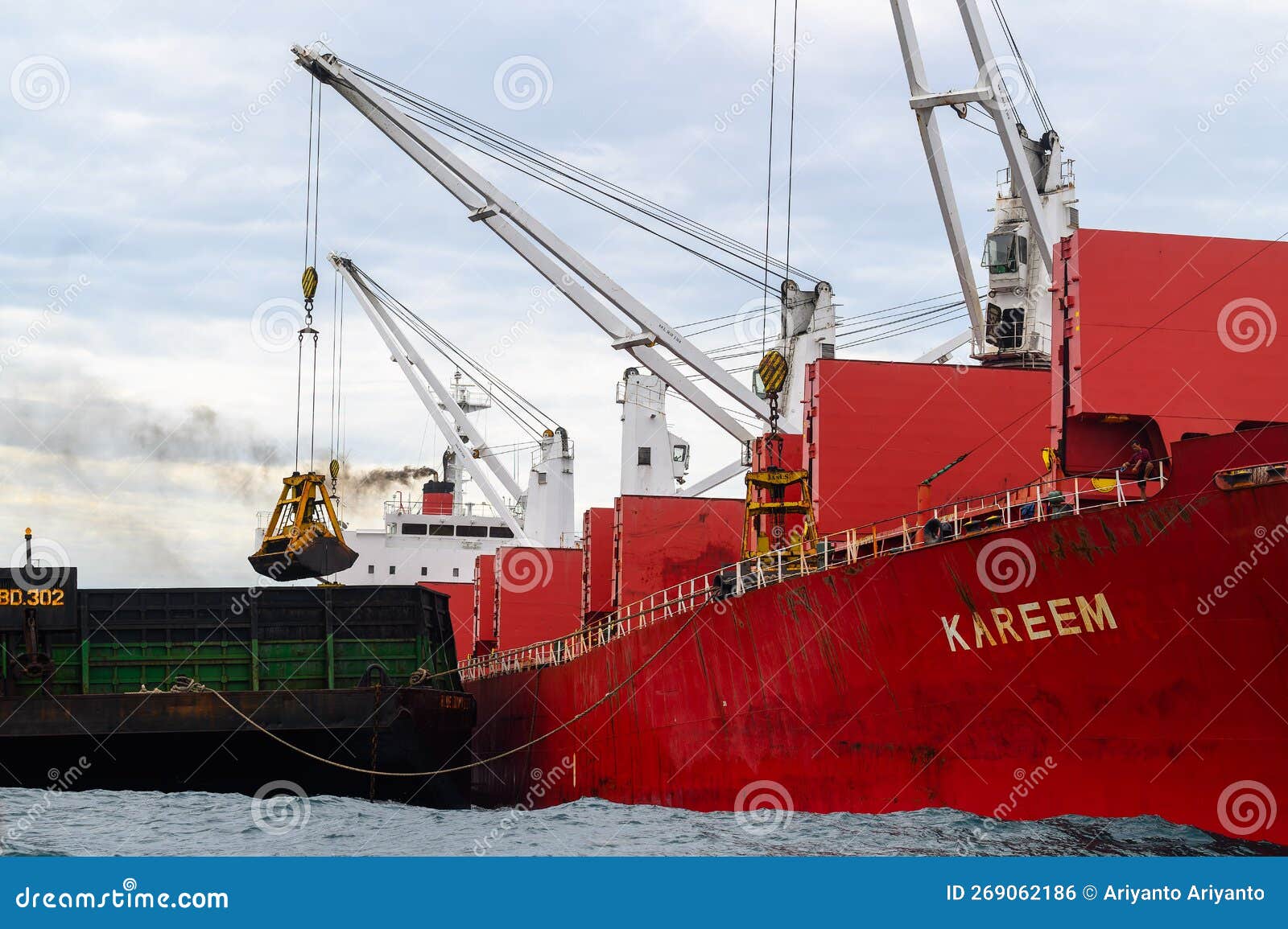 Transporting Coal into Large Ships in the Middle of the Sea Editorial ...