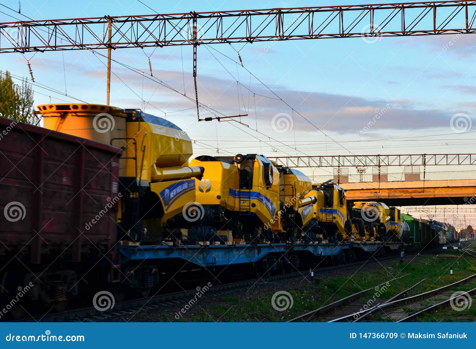 Transporting Combine Harvesters by Rail. Editorial Stock Image - Image ...