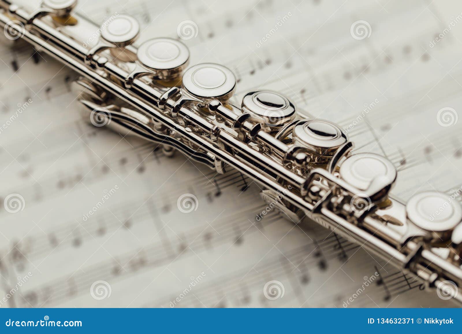 Transverse Flute on Music Sheet Stock Image - Image of arts, backdrop ...