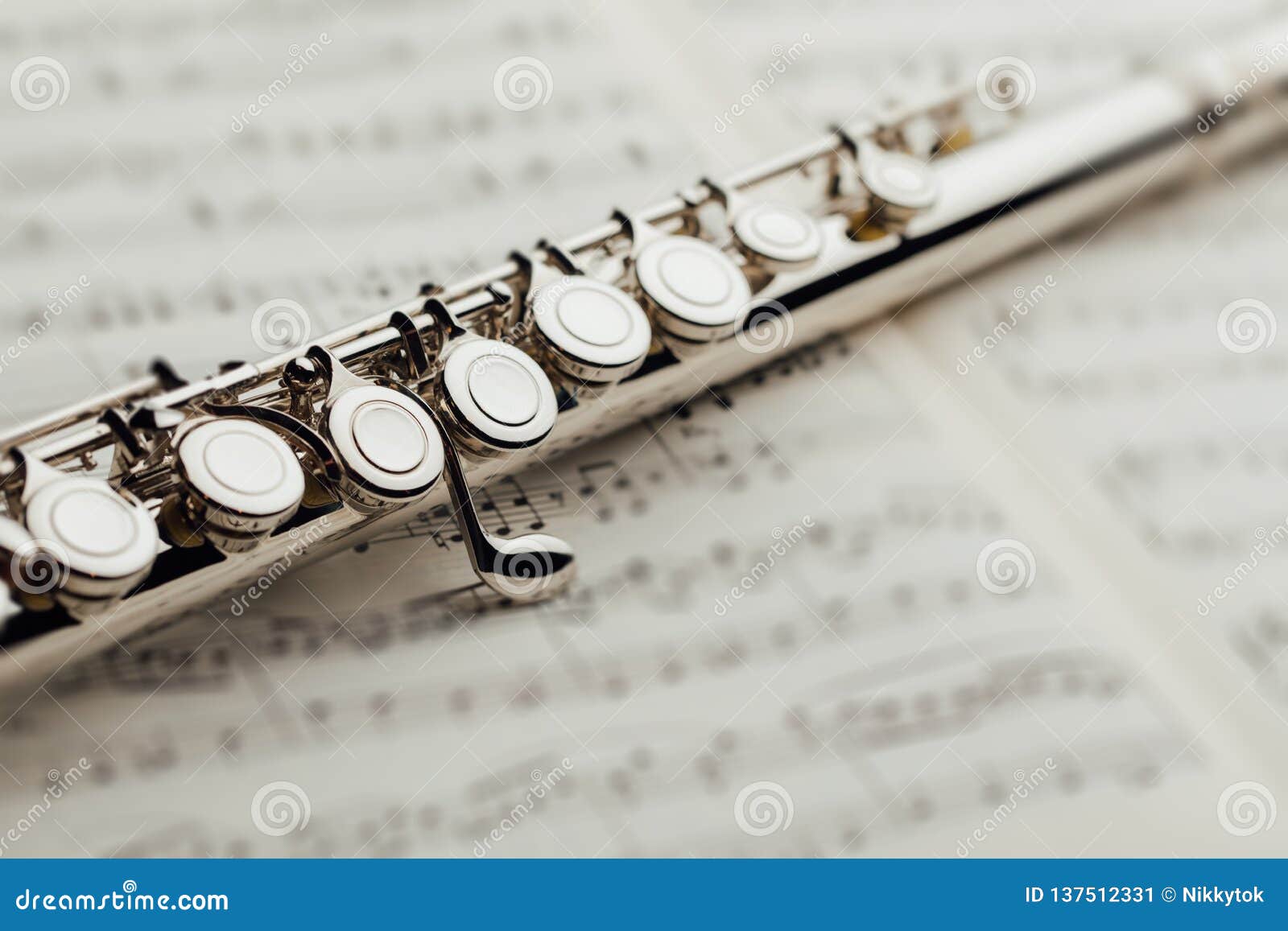 Transverse Flute on Music Sheet Stock Image - Image of play, instrument ...