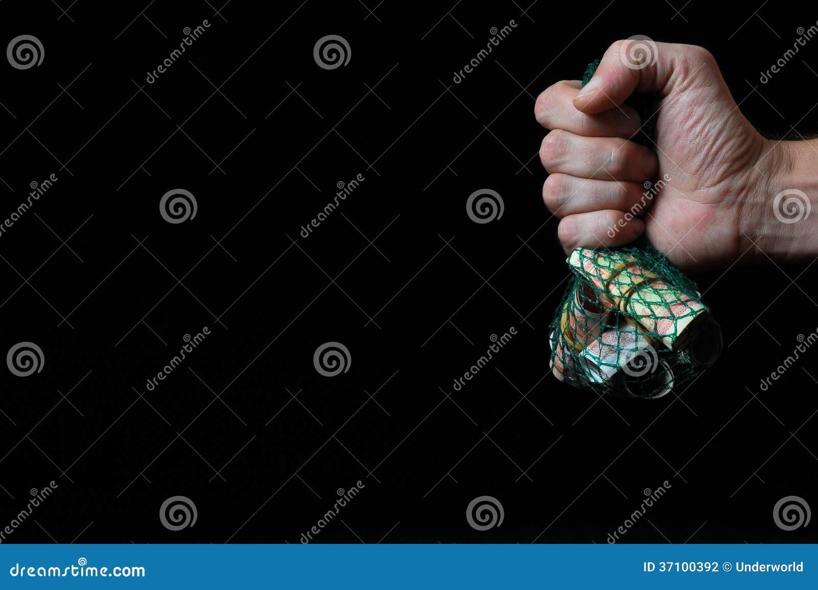 Trapped Money and an Hand stock photo. Image of wealth - 37100392