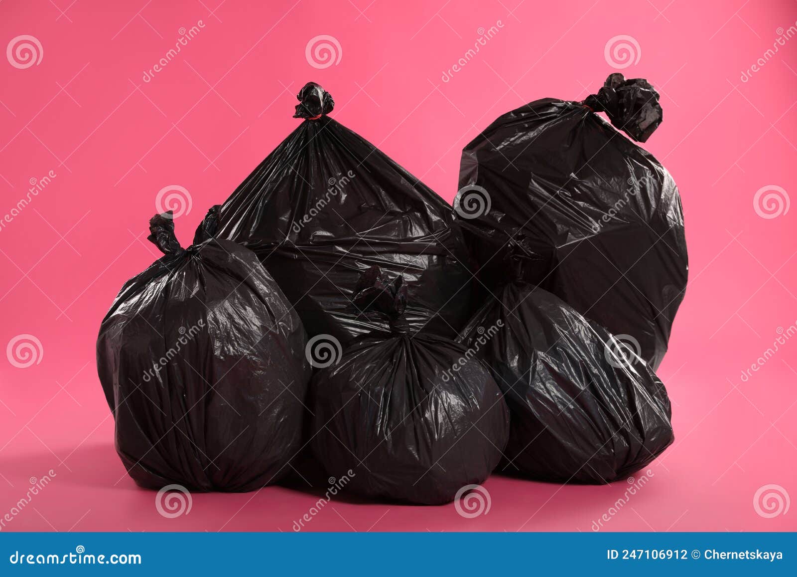 Trash Bags Full of Garbage on Pink Background Stock Photo - Image of ...