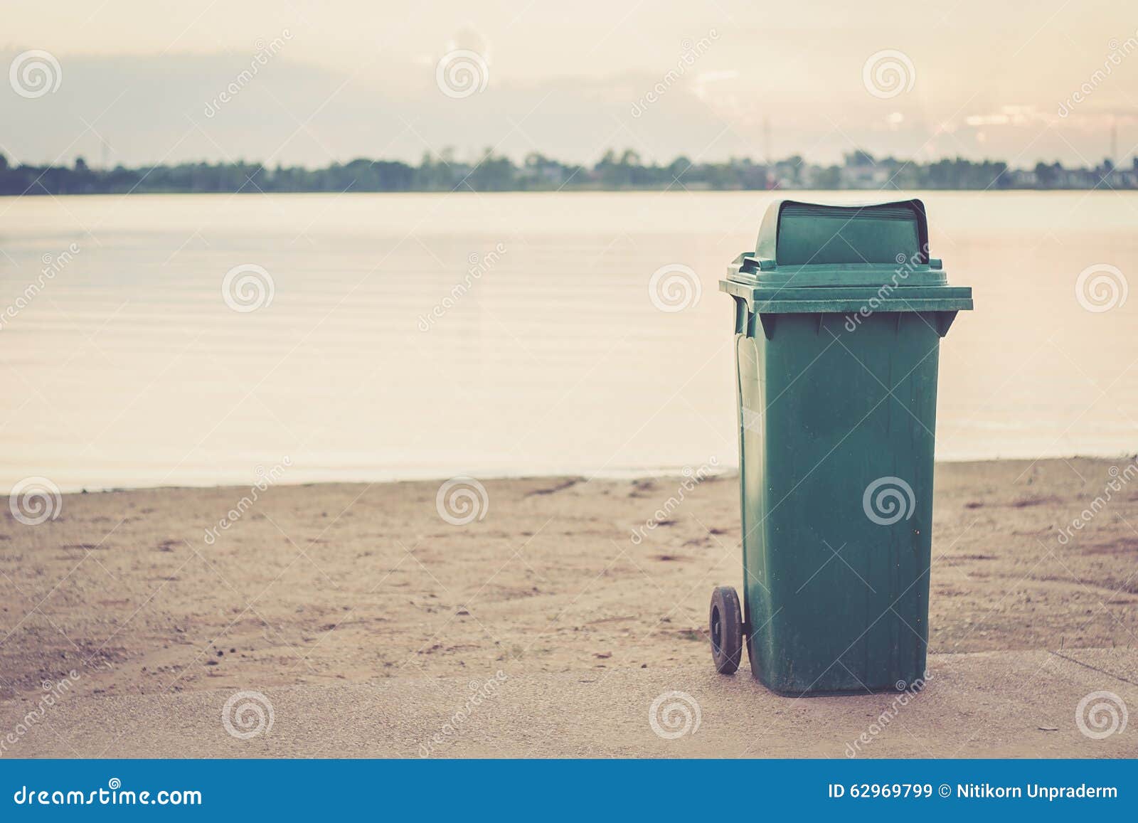 A trash bin on the beach stock image. Image of protect - 62969799
