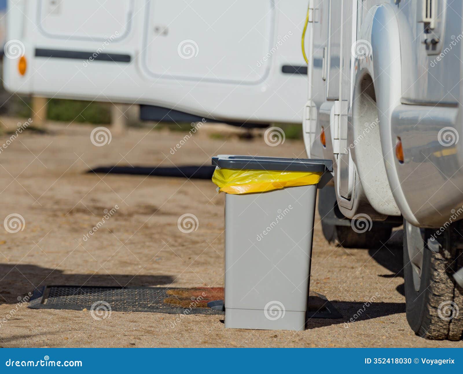 Trash Can in Front of Caravan Stock Photo - Image of campsite, basket ...