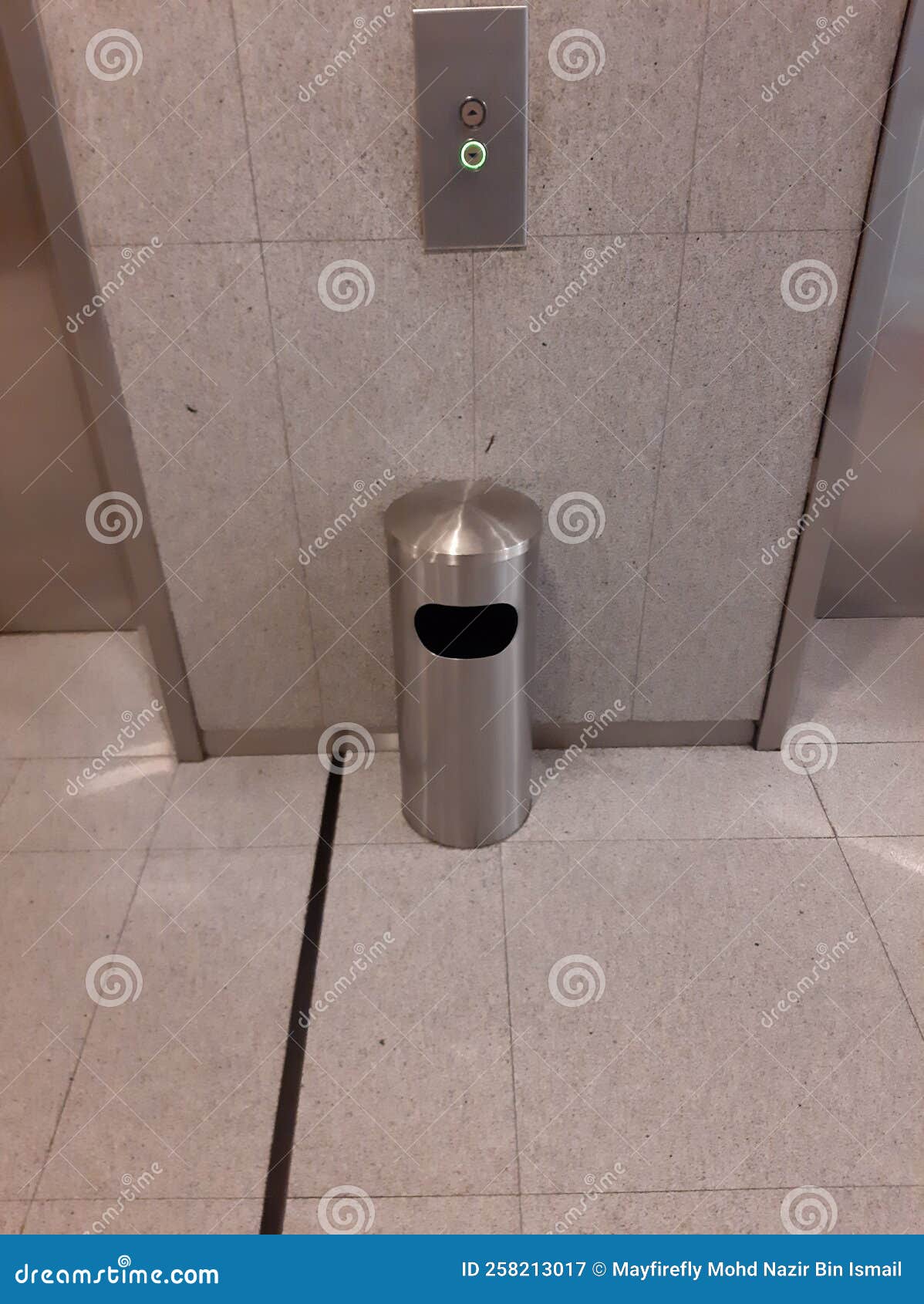 The Trash Can is Next To the Elevator To Make it Easier for Users To ...