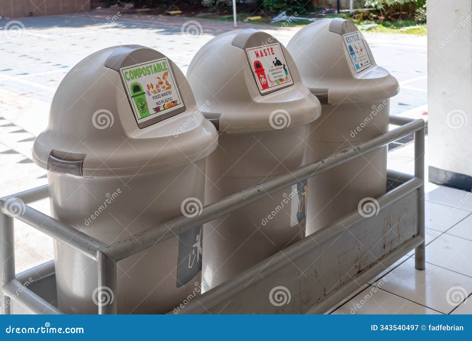 Trash Can with Three Compartments Based on Categories for Recycling at ...