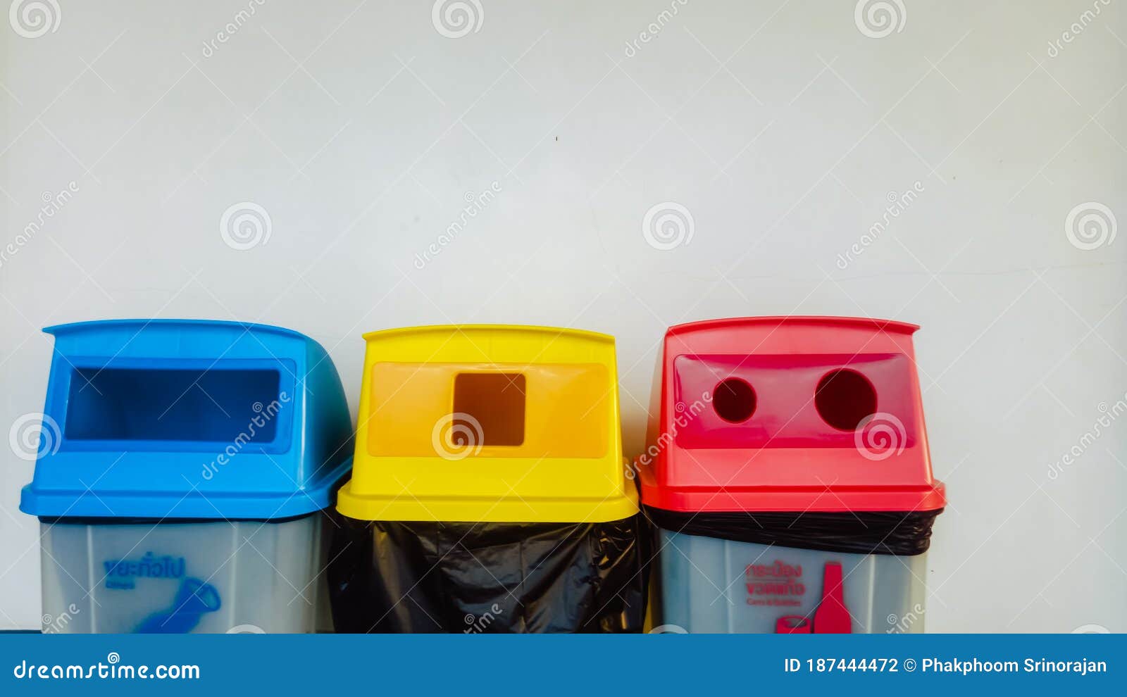 Trash Cans Arranged in Multiple Colors Stock Photo - Image of track ...