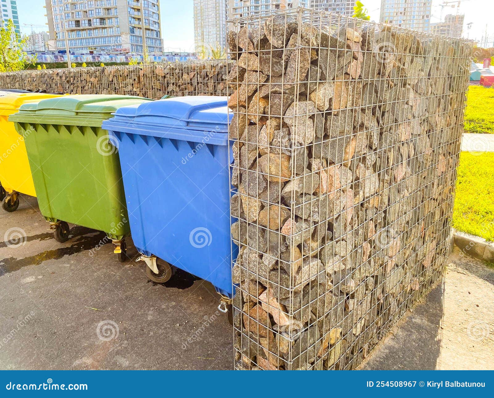 Trash Cans in the Backyard. Separate Collection of Garbage in Multi ...