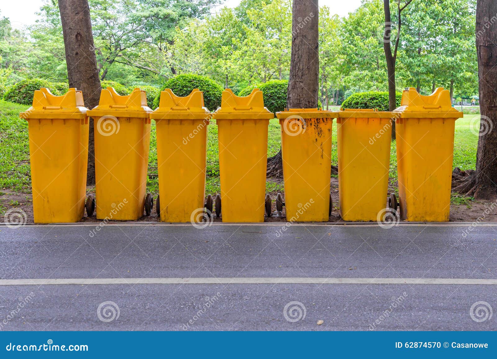Trash Cans in the Park beside the Walk Way Stock Photo - Image of ...