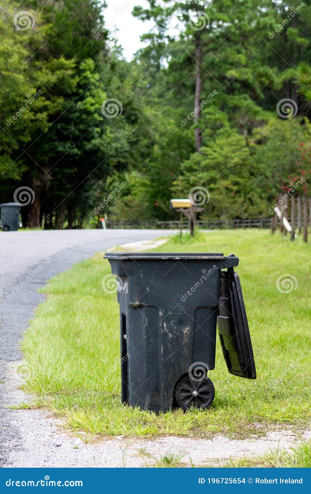 Trash Cans On The Road Stock Photo | CartoonDealer.com #196725654