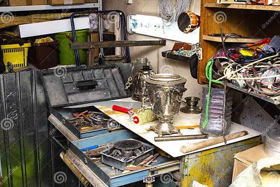 Trash in the Garage, Piled Up Different Old Things Stock Photo - Image ...
