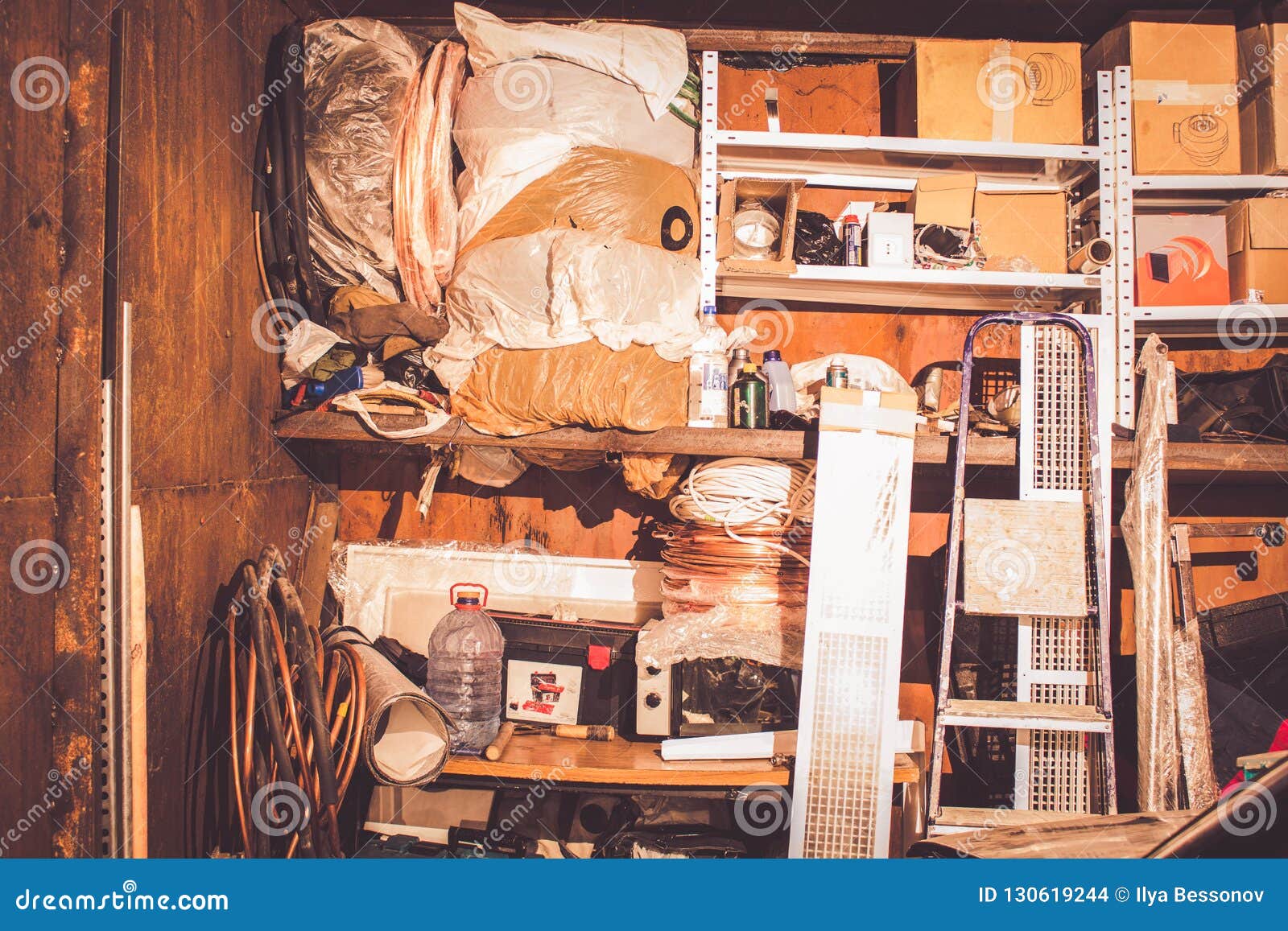 Trash in the Garage, Piled Up Different Old Things Stock Photo - Image ...