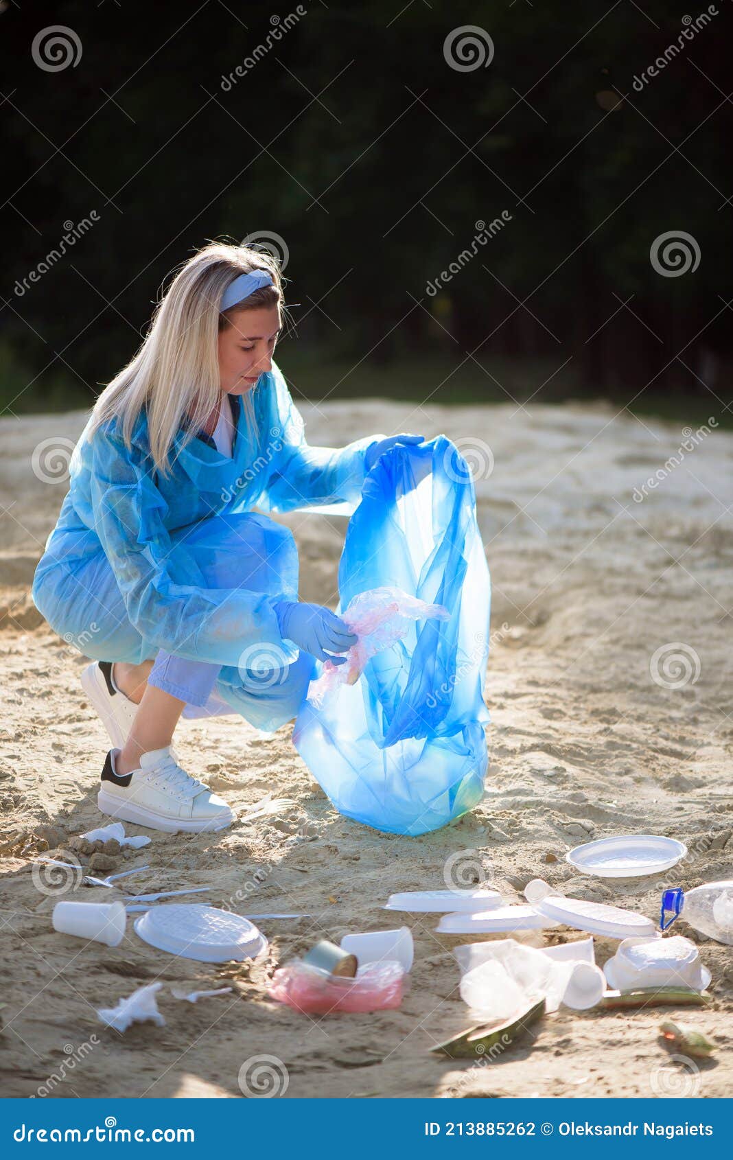 Trash Keeper or Garbage on the Beach. Stock Photo - Image of family ...