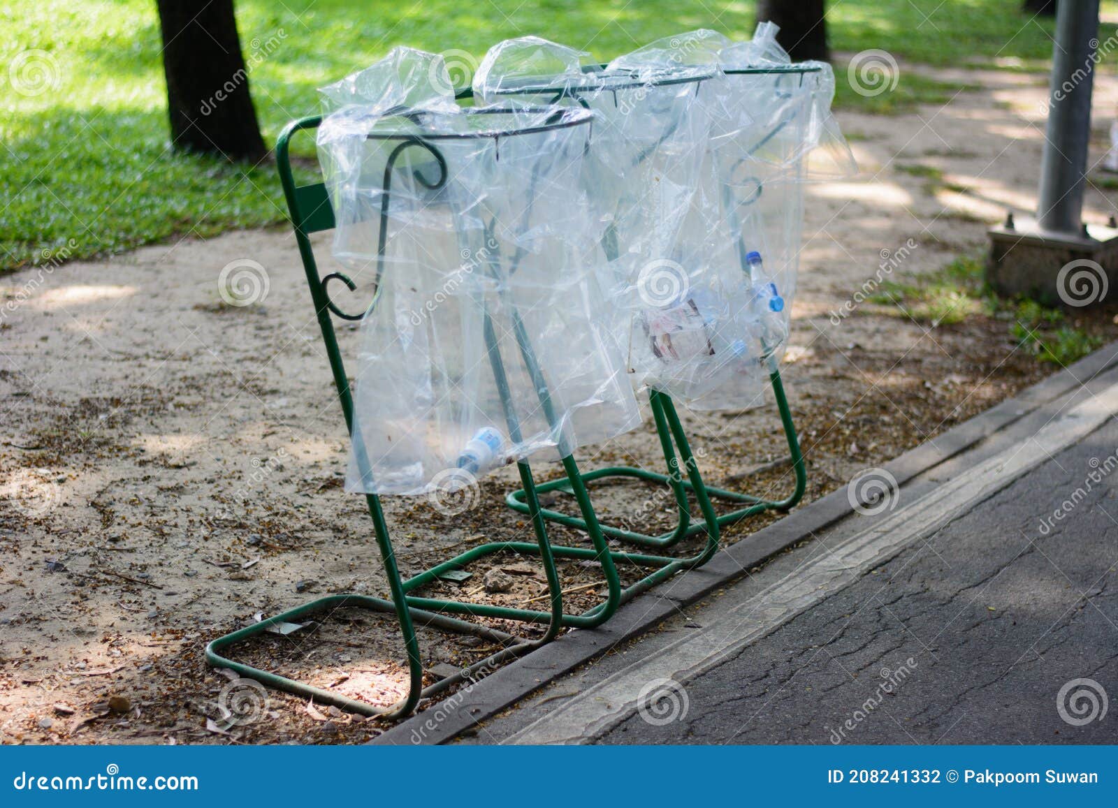 Trash in a park stock photo. Image of park, green, blue - 208241332