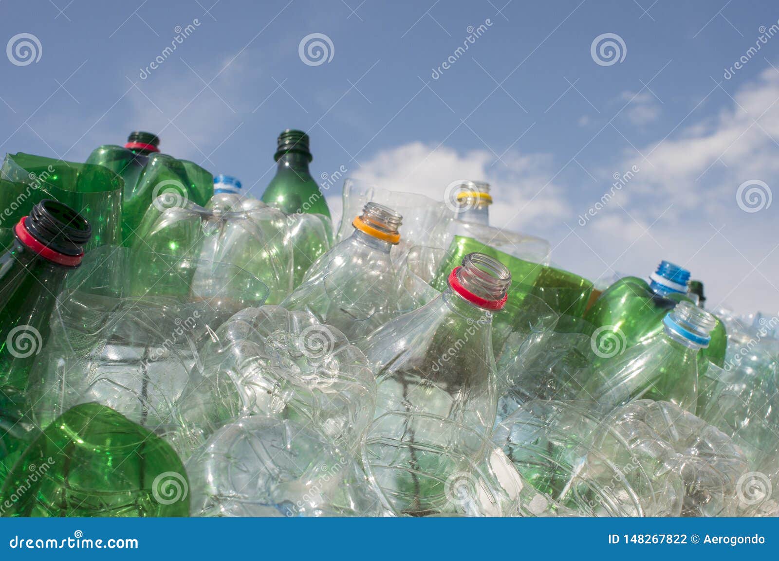 Trash Can With Pile Of Clothes. Fashion Harms The Environment. Royalty ...