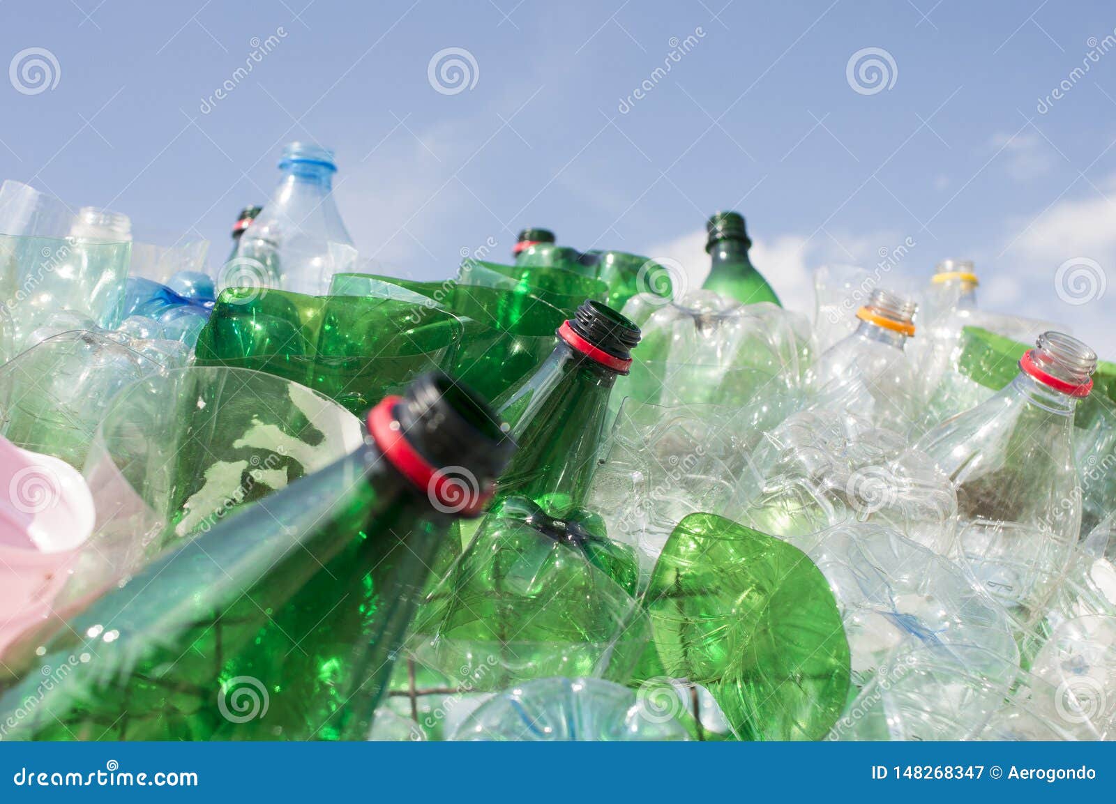 Trash Can With Pile Of Clothes. Fashion Harms The Environment. Royalty ...