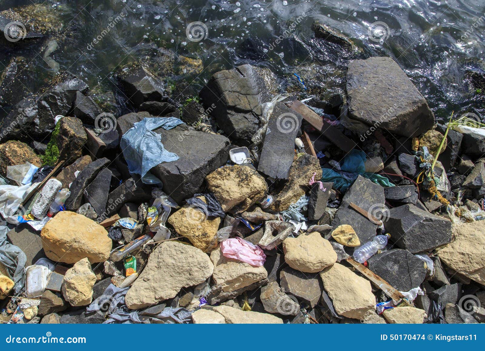 Trash polluting water stock photo. Image of smelling - 50170474