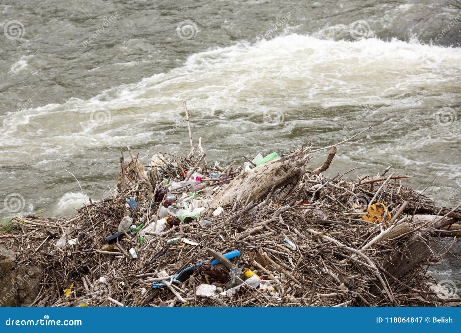 Trash on the river stock image. Image of danger, landfill - 118064847