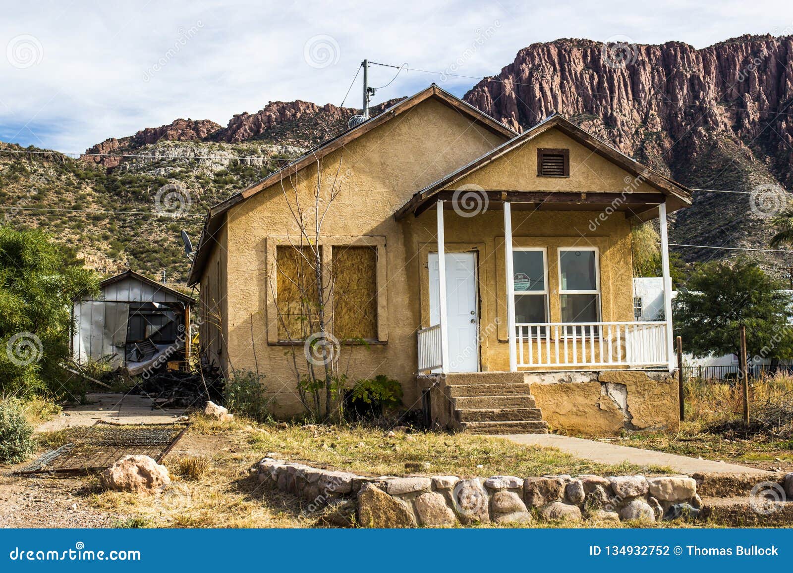 Trashed Home with Boarded Up Windows Stock Photo - Image of mountains ...