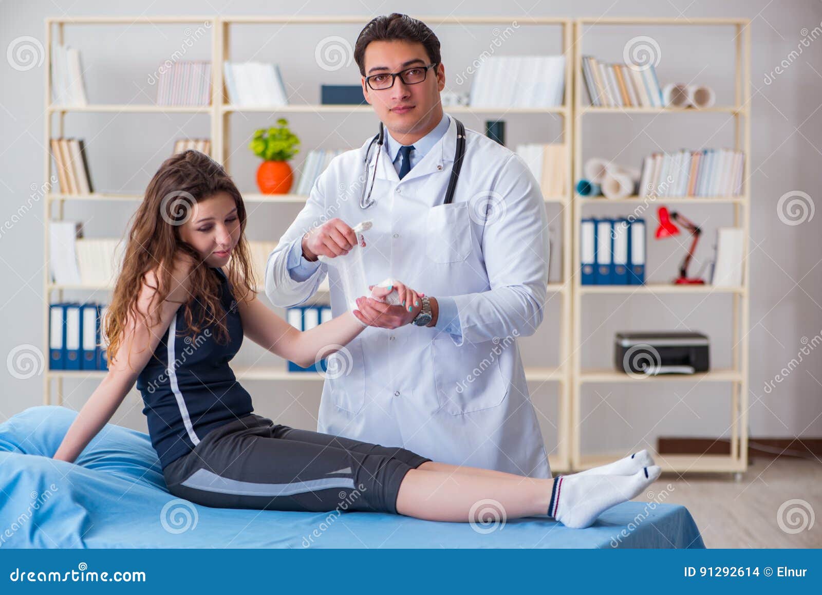 The Traumatologist is Taking Care of the Patient Stock Photo - Image of ...