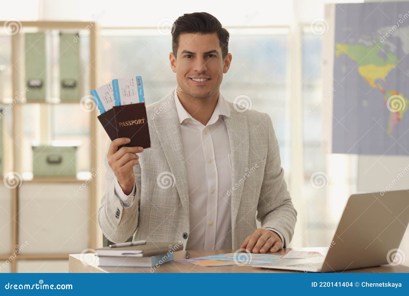 Travel Agent with Tickets and Passports in Office Stock Photo - Image ...