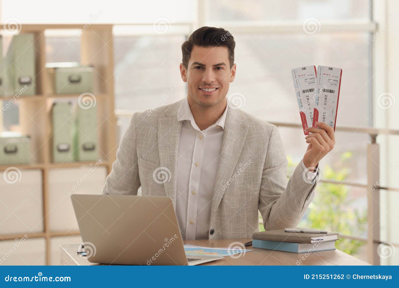 Travel Agent with Tickets at Table in Office Stock Photo - Image of ...