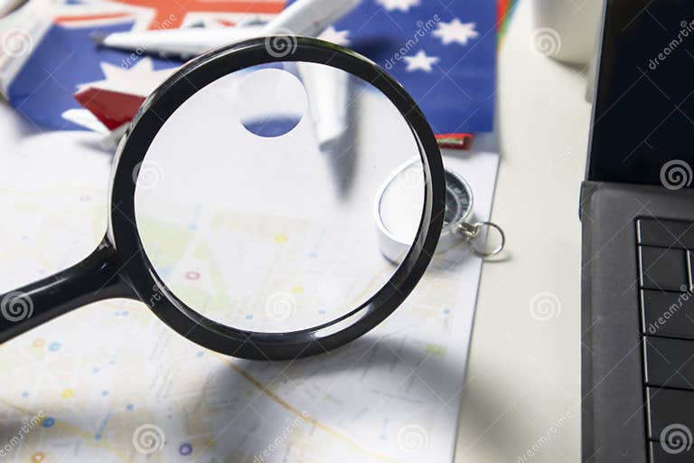Travel Compass and Magnifying Glass. ,identifying a Destination and ...