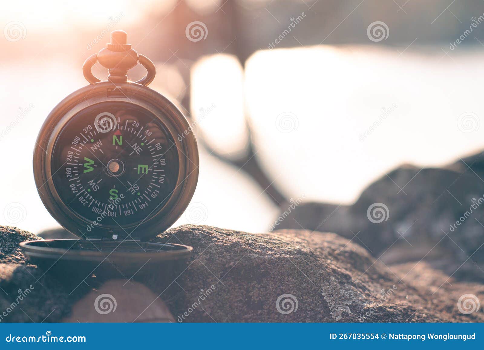 Travel of Tourists with Compass. Compass of Tourists on Mountain Stock ...