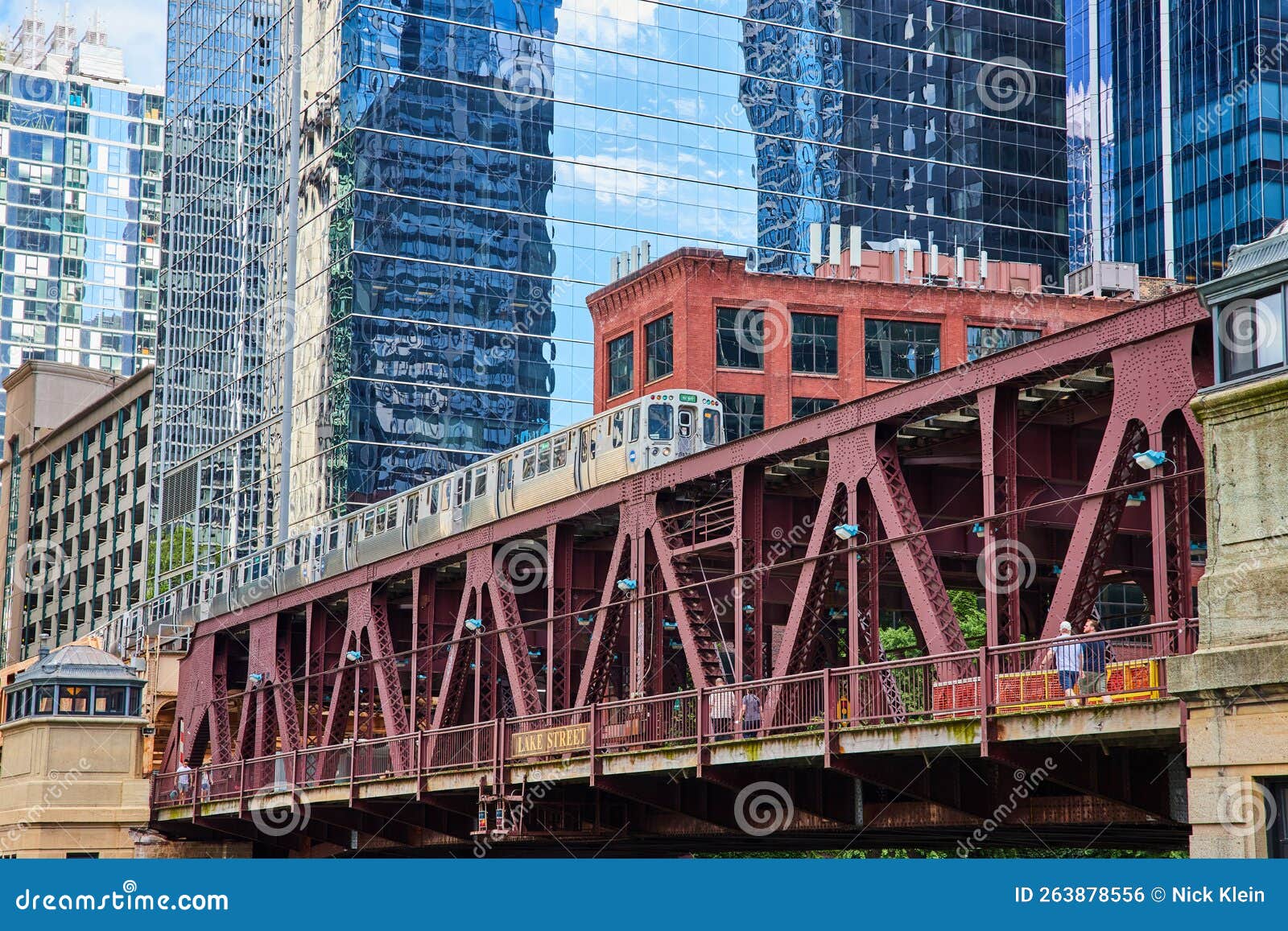 Travel Train in Chicago Going Over Bridge by Skyscrapers Stock Photo ...