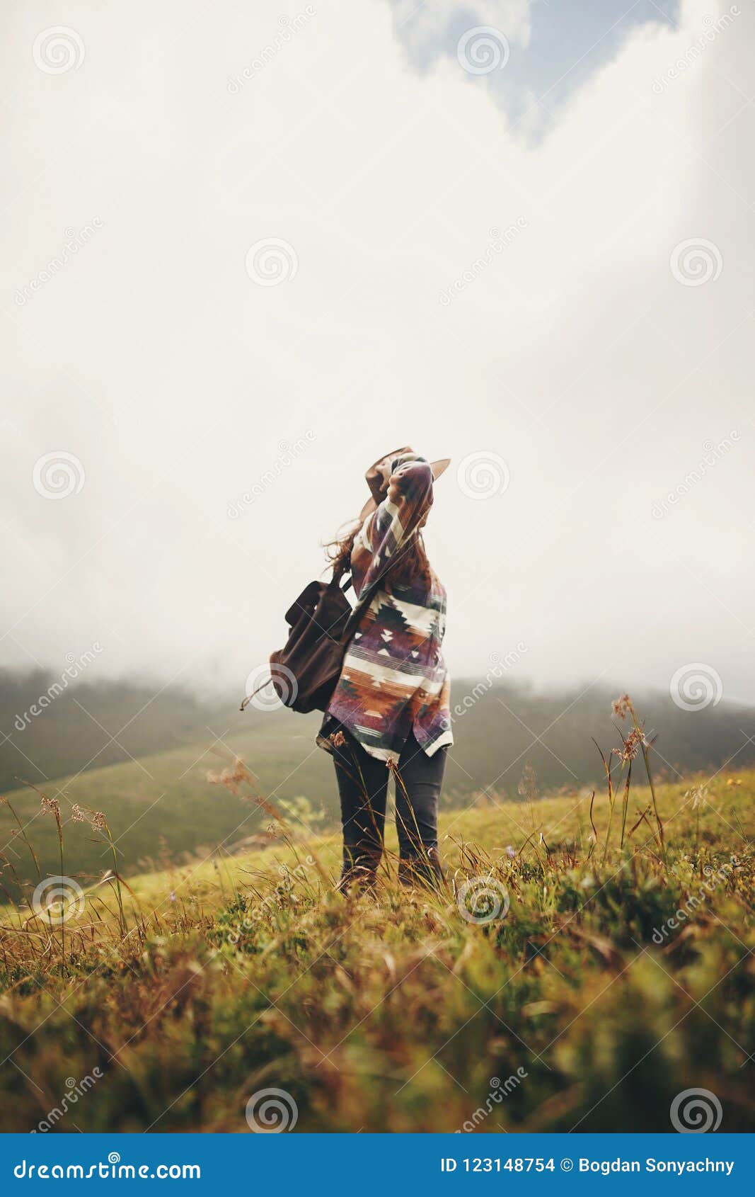 Travel and Wanderlust Concept. Stylish Traveler Hipster Girl Holding ... Travel and Wanderlust Concept. Stylish Traveler Hipster Girl Holding ...