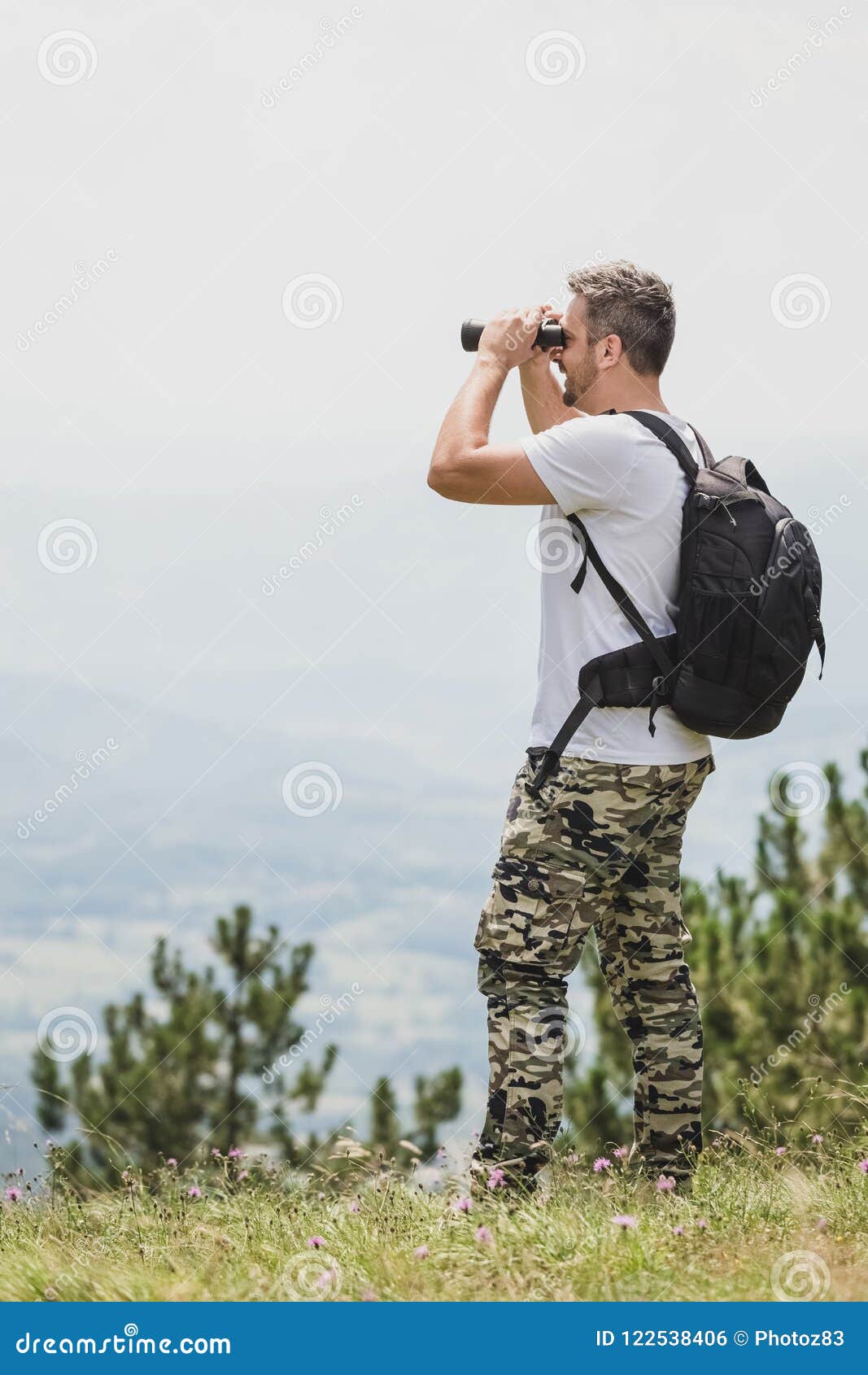 Man Enjoying the Nature and Looking through Binoculars Stock Photo ...