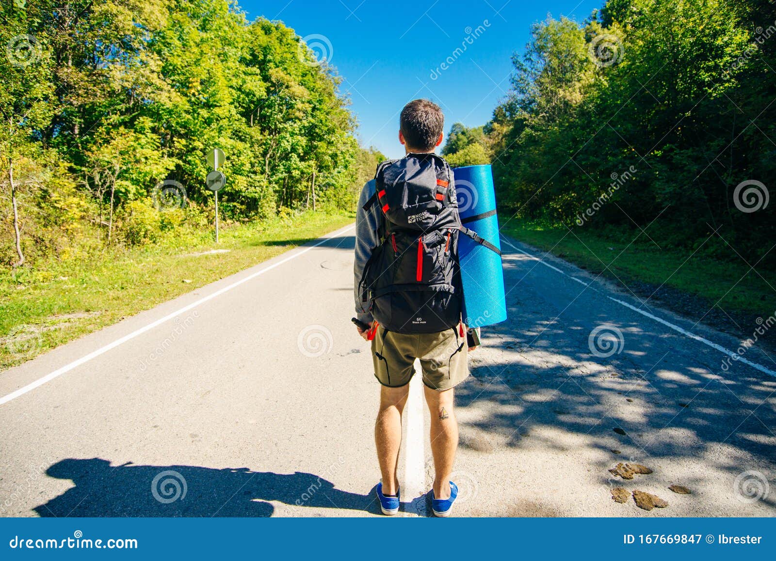 Traveler with a Big Backpack on the Road Editorial Photography - Image ...