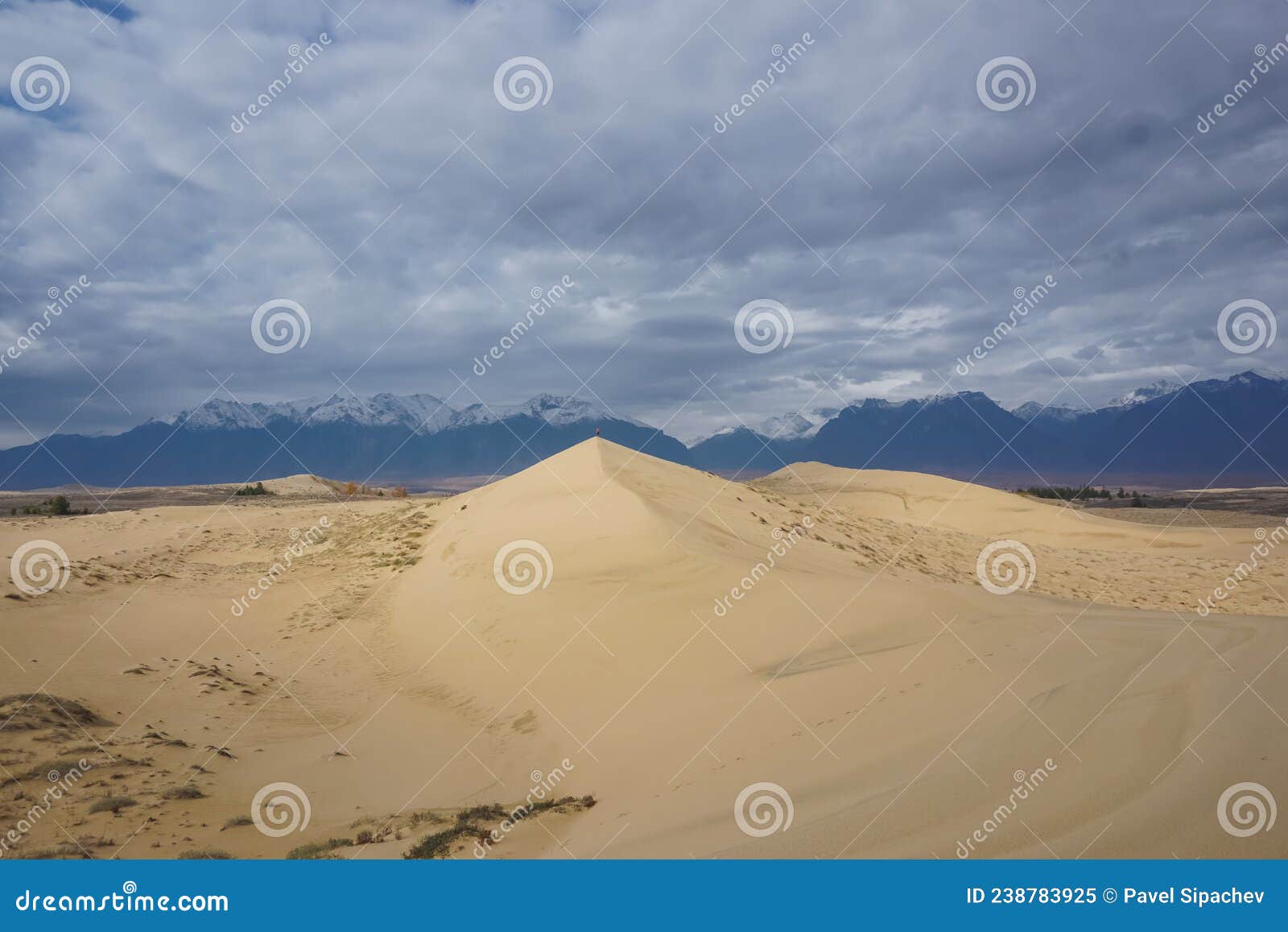 Traveler at the Chara Sand Dunes Stock Image - Image of chara, hill ...